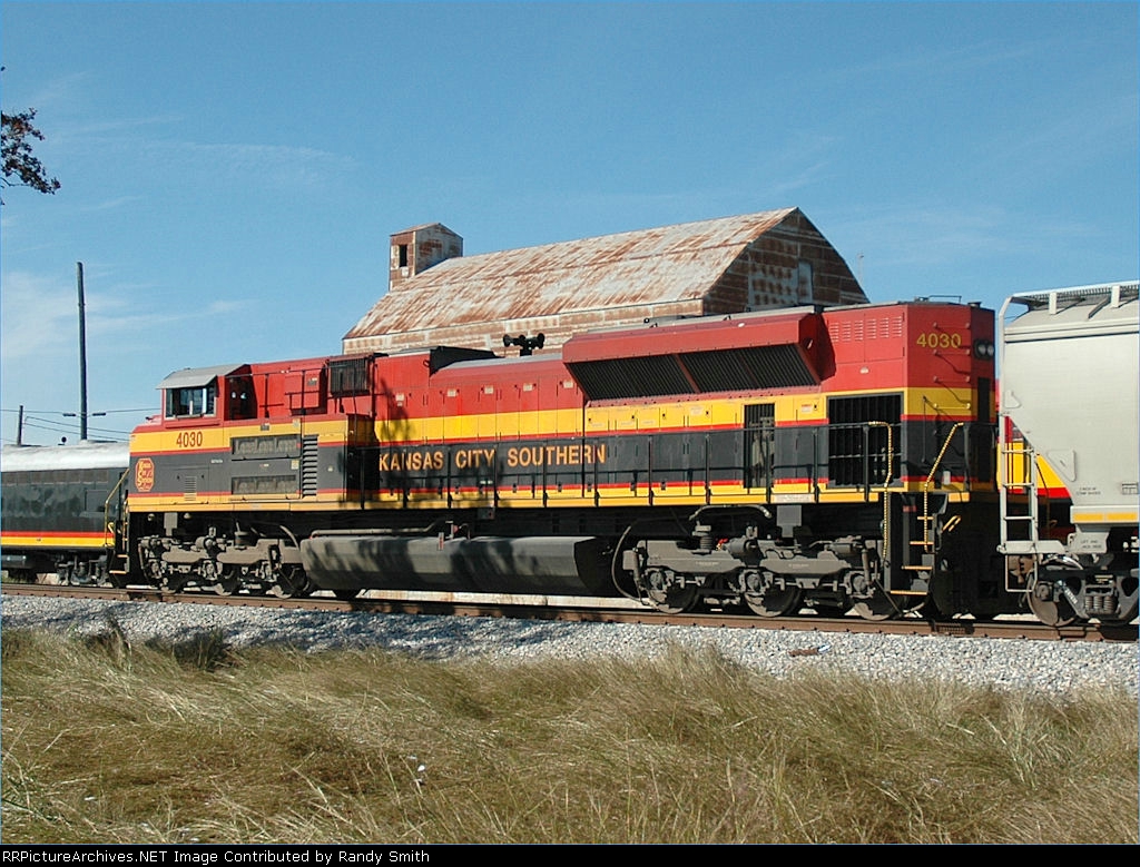 KCS 4030 roaring past the KCS Holiday Special